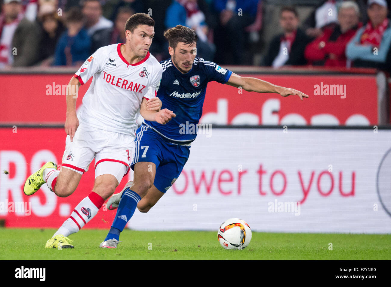 Cologne, Germany. 25th Sep, 2015. Koeln's Jonas Hector (L) and ...