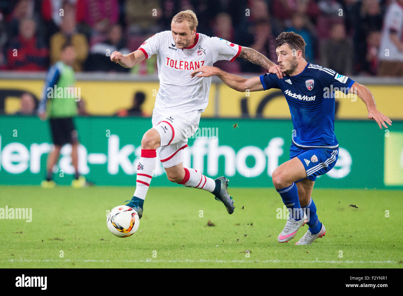 Cologne, Germany. 25th Sep, 2015. Koeln's Marcel Risse (L) and ...