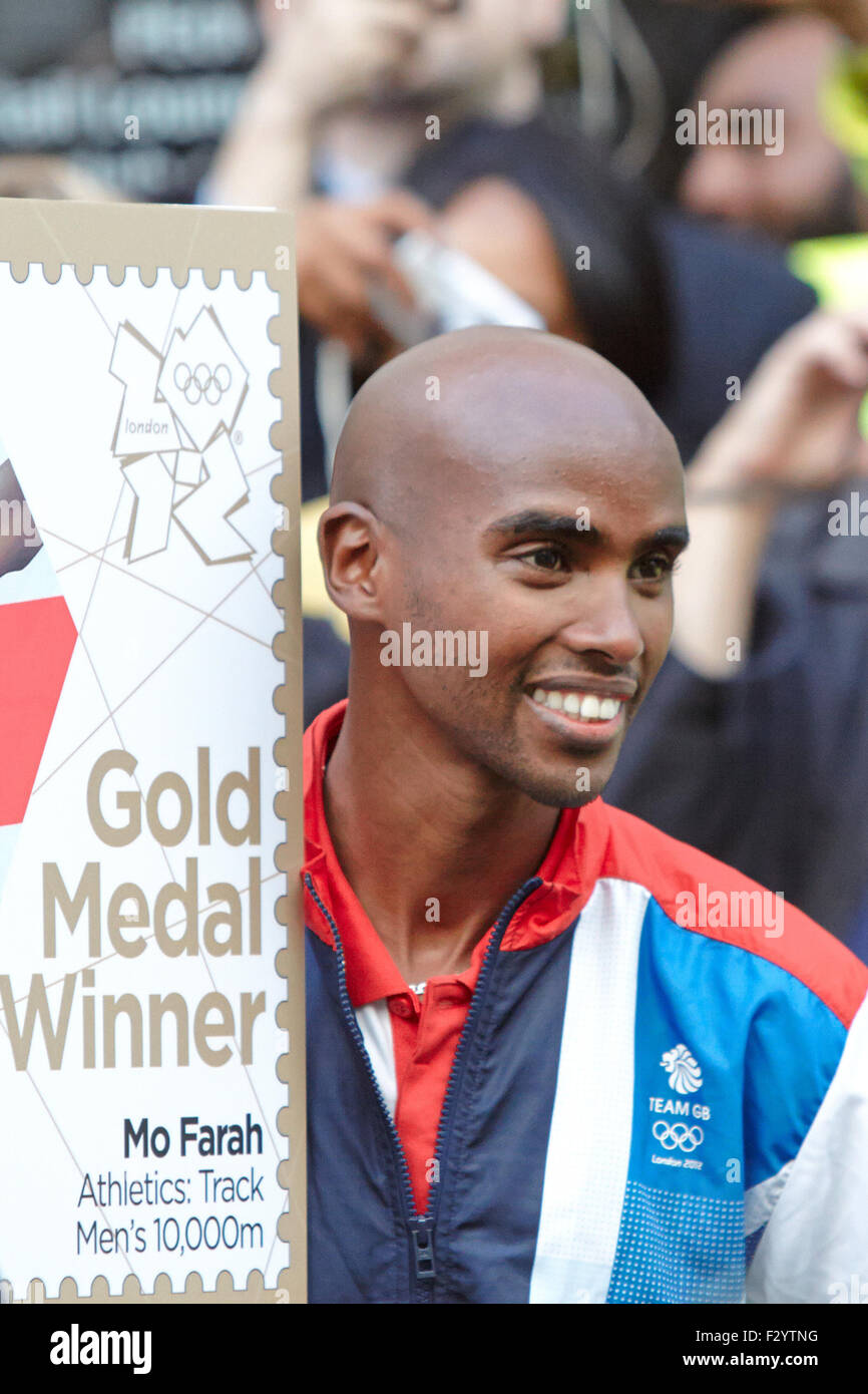 Mo Farah signs autographs during the Olympic and Paralympic Parade of ...