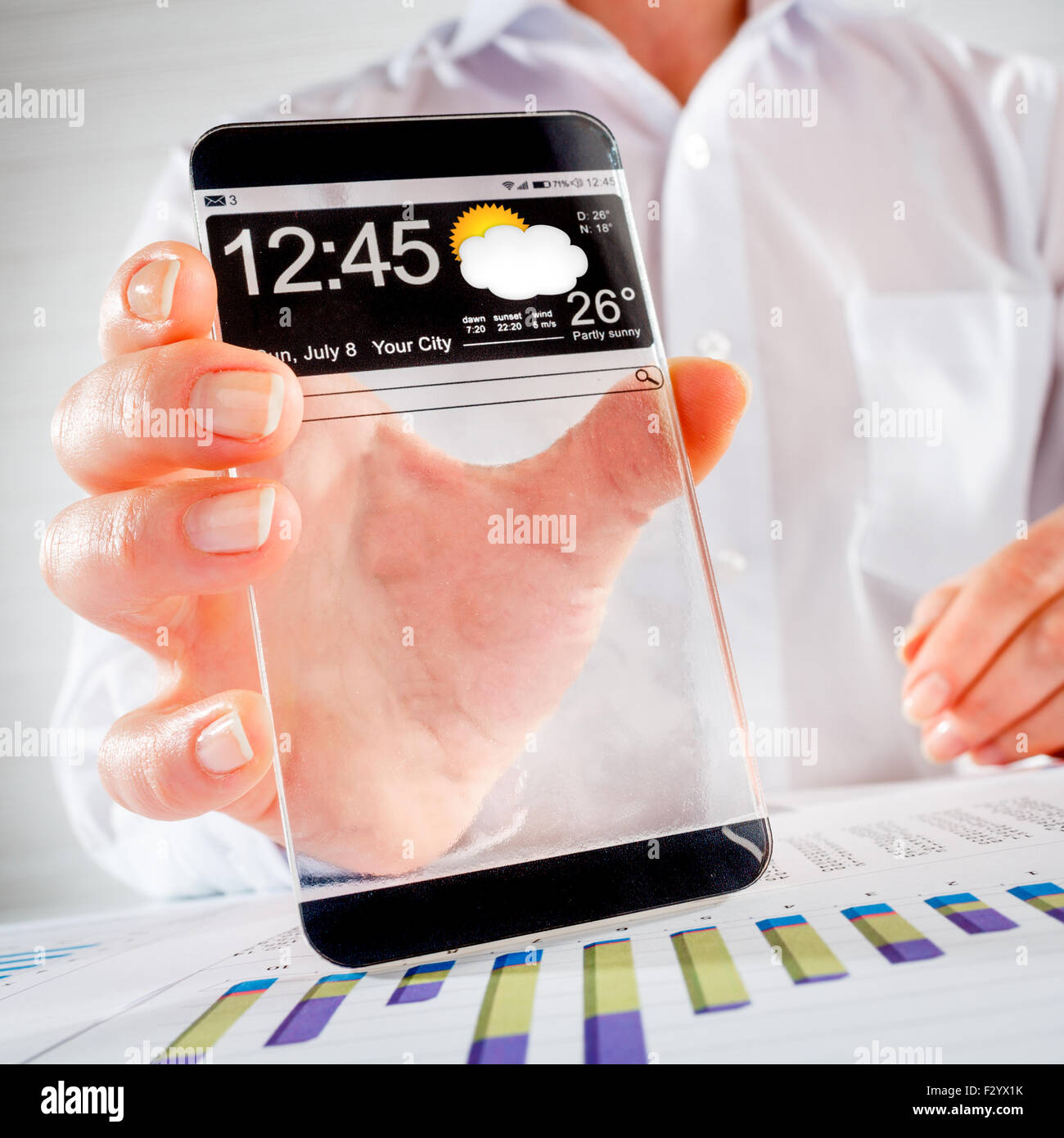 Futuristic Smart phone (phablet) with a transparent display in human ...