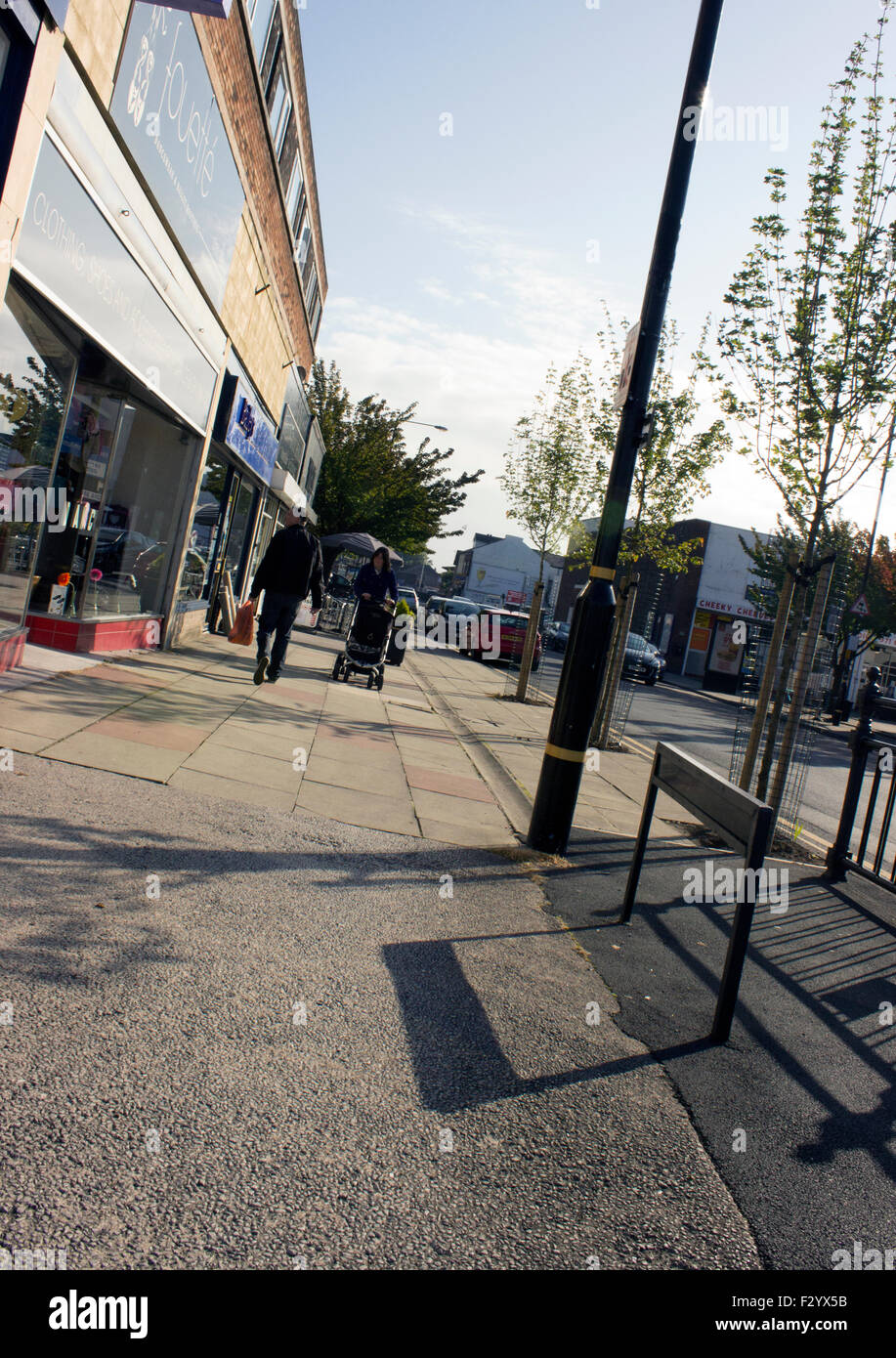 Main street in Urmston with two people walking towards the camera ...