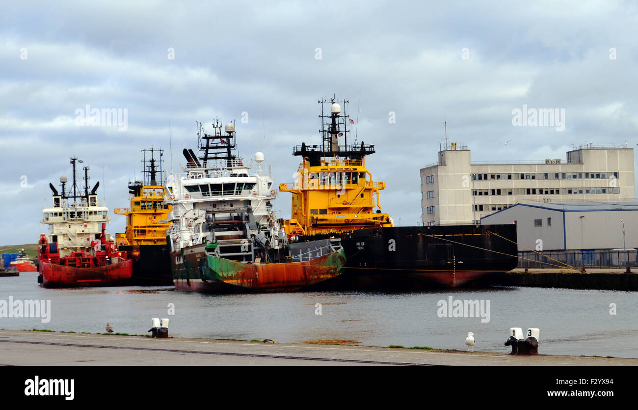 Norwegian oil platform supply vessels moored in Aberdeen harbour Stock ...