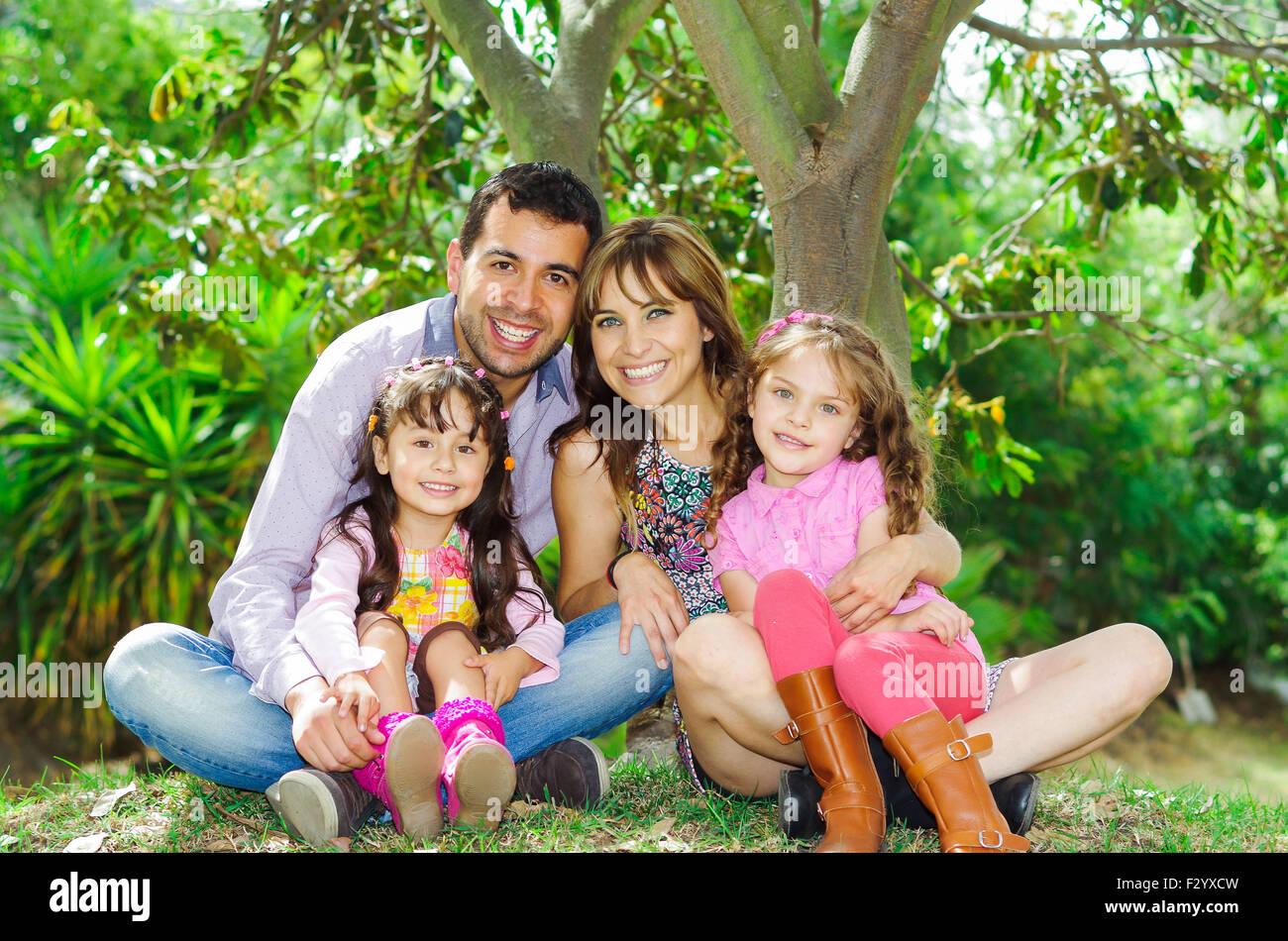 Hispanic Family Playing Outside