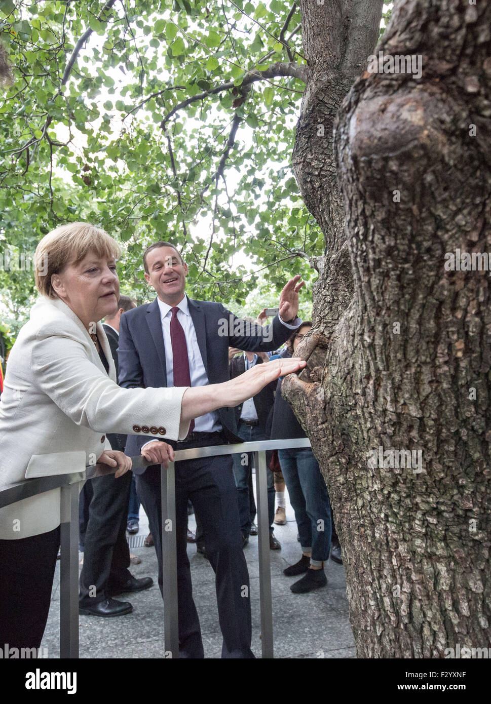 New York, USA. 26th Sep, 2015. German Chancellor Angela Merkel looks at ...