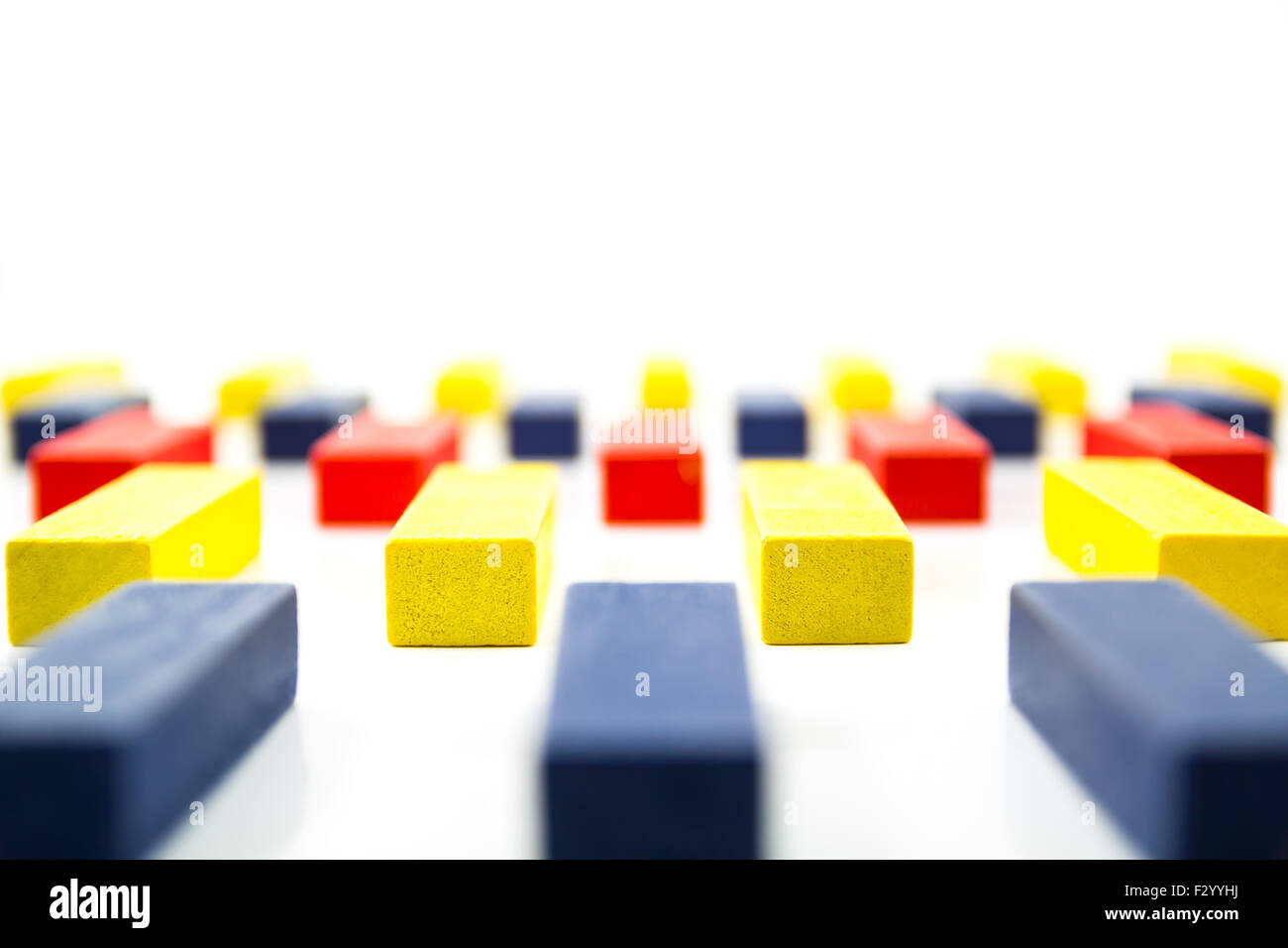 Red, Blue, Yellow Wooden toy blocks on white background Stock Photo - Alamy