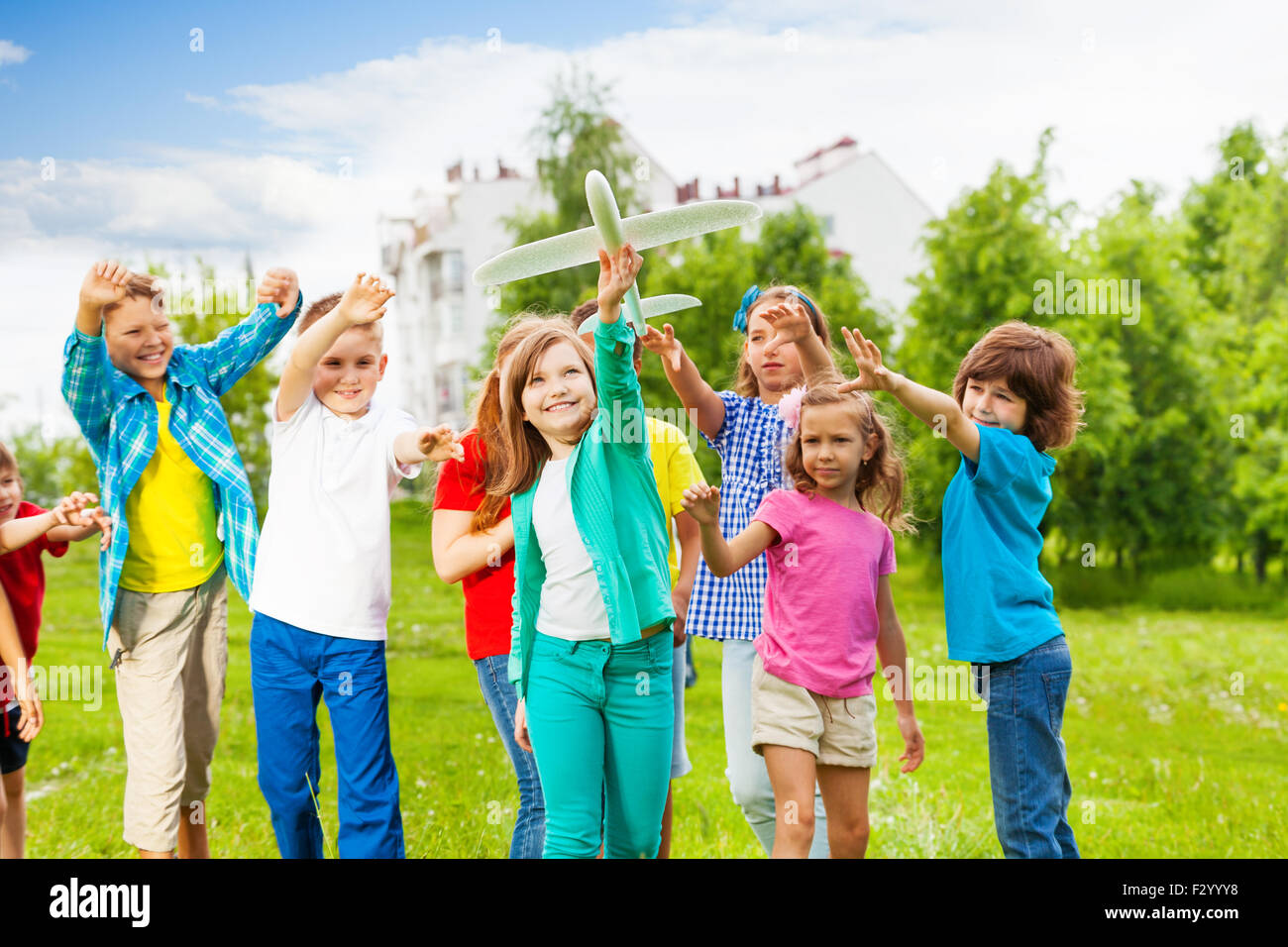 Children walk behind hi-res stock photography and images - Alamy