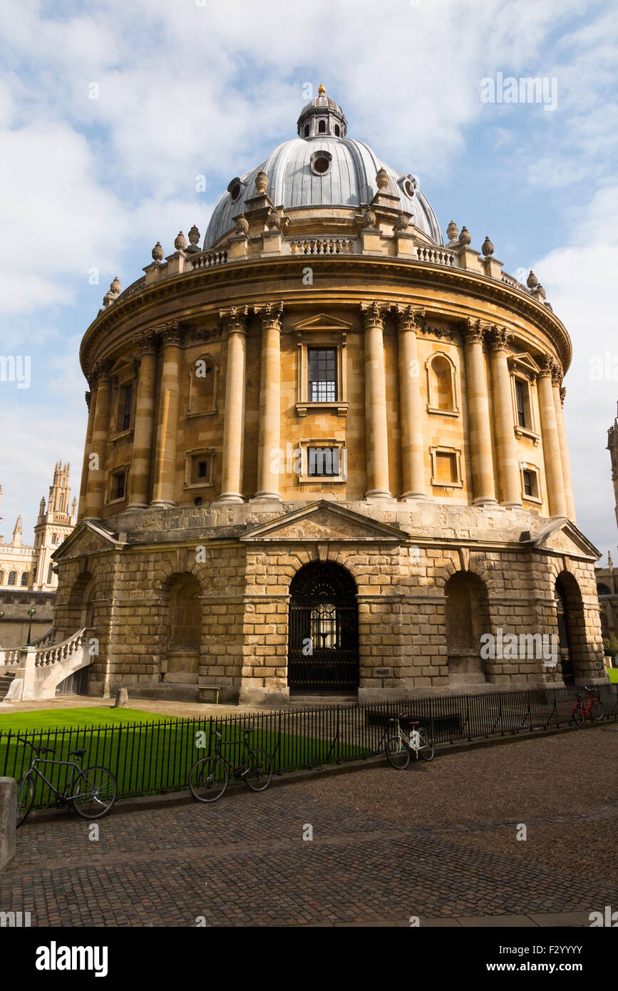 Radcliffe Camera building, with sun on a sunny day with blue sky ...