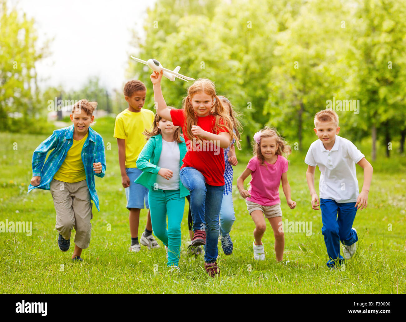 Children boy girl run behind hi-res stock photography and images - Alamy