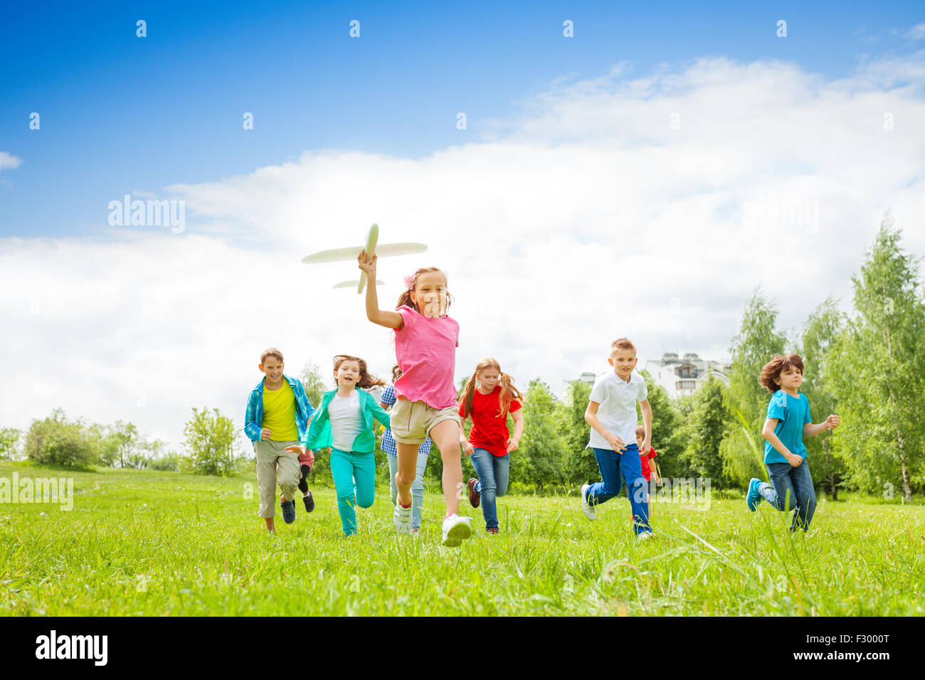 Children boy girl run behind hi-res stock photography and images - Alamy