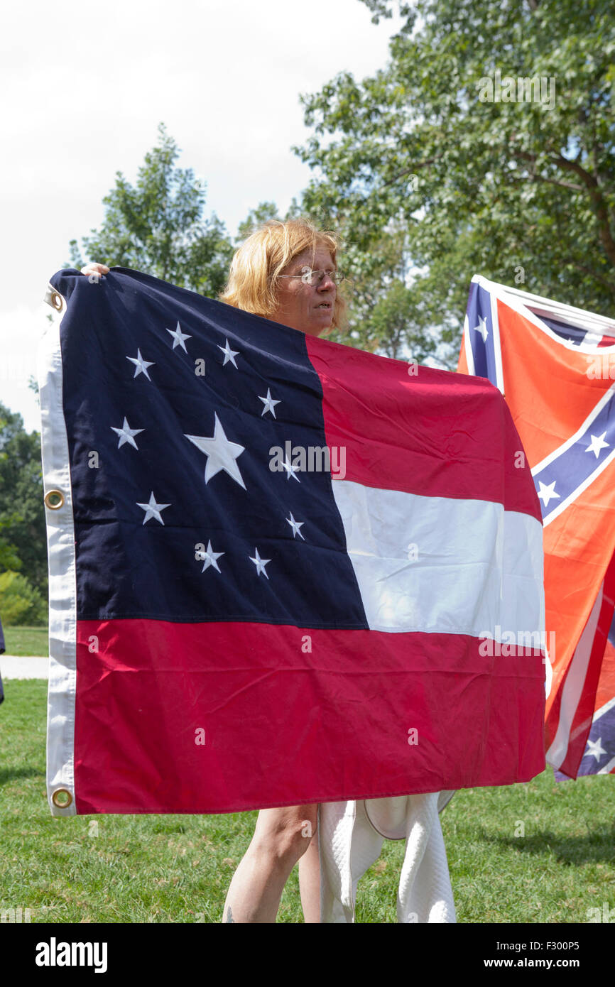 Woman holding a 11 star Confederate National flag at Sons of ...