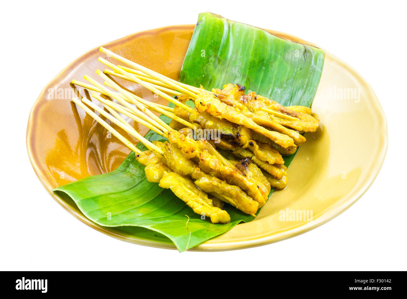 Pork Satay on white background Stock Photo - Alamy