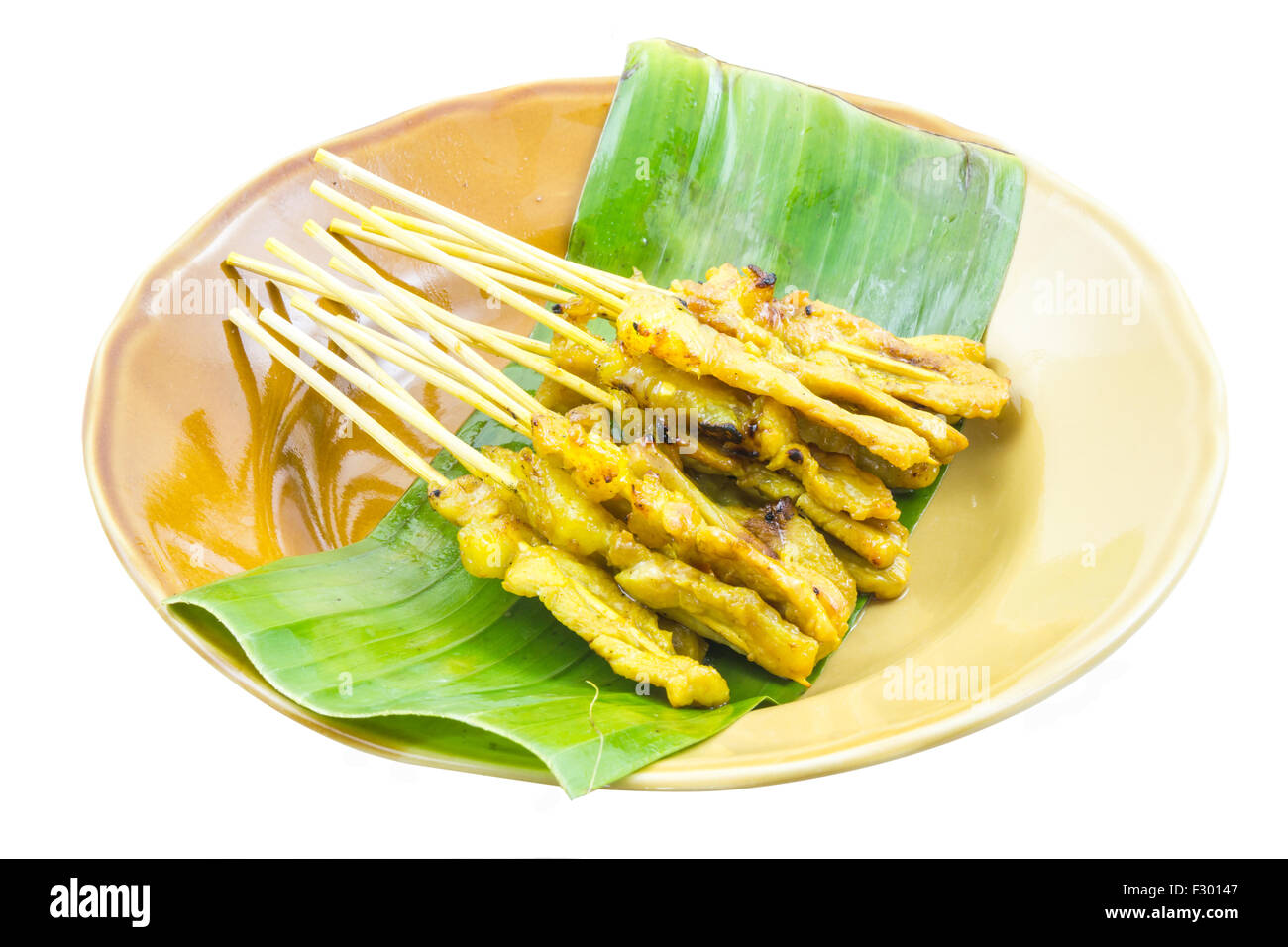 Pork Satay on white background Stock Photo - Alamy