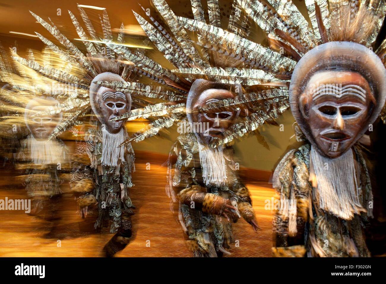 Carnival performers in traditional costume dance during a cultural ...