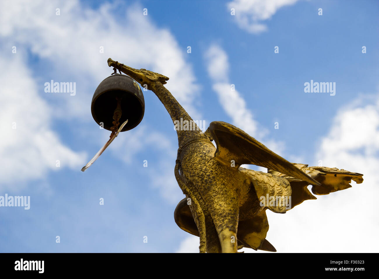 Kinnaree, Mythical female bird with bell in mount in sky background ...