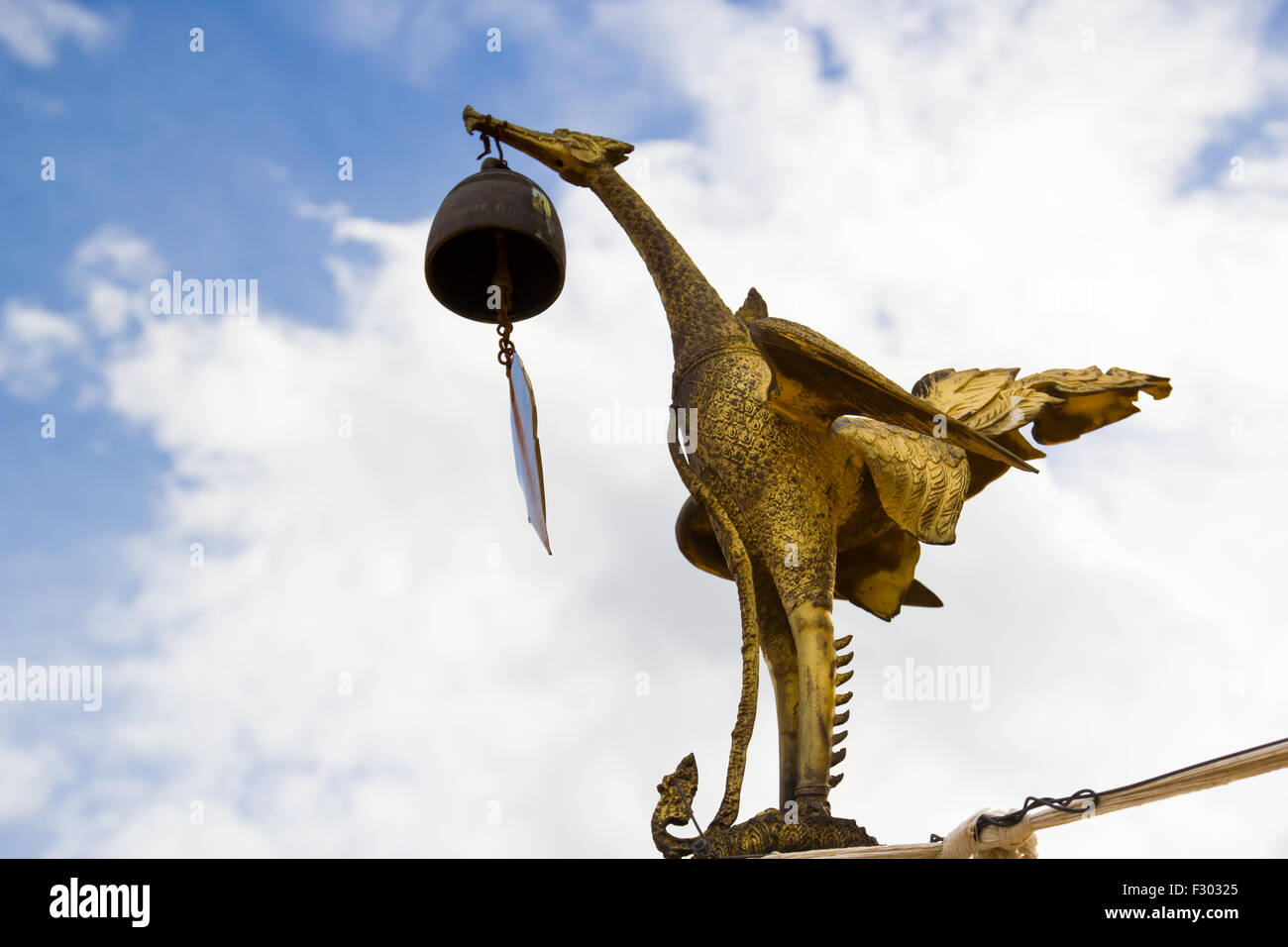 Kinnaree, Mythical female bird with bell in mount in sky background ...
