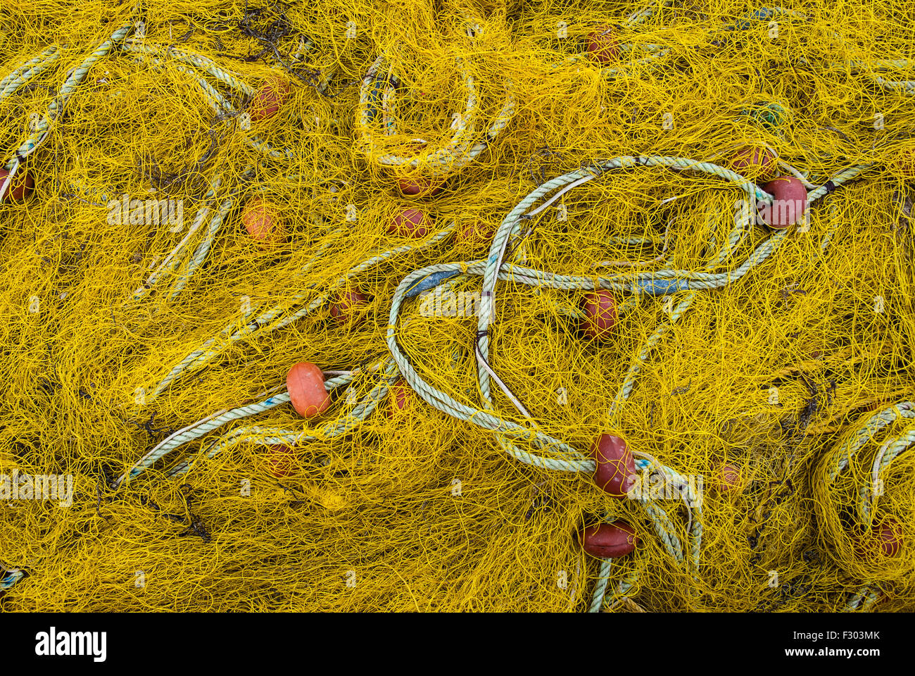 Yellow fishing nets in a Greek island Stock Photo - Alamy