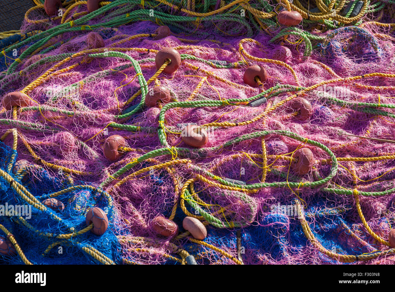 Colorful fishing nets in a Greek island Stock Photo - Alamy