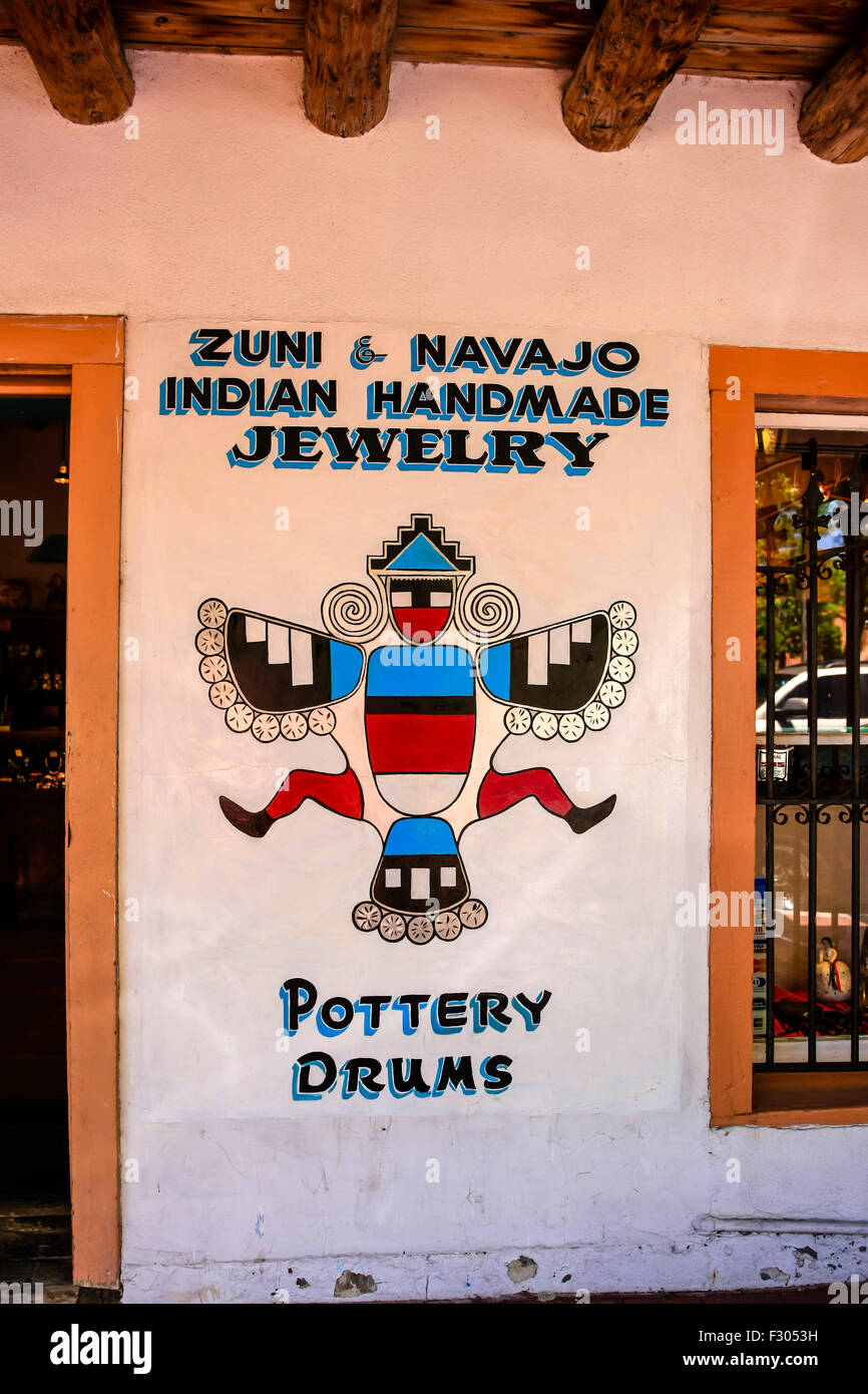 Hand-painted on the wall outside a store in Albuquerque NM, a Zuni bird ...