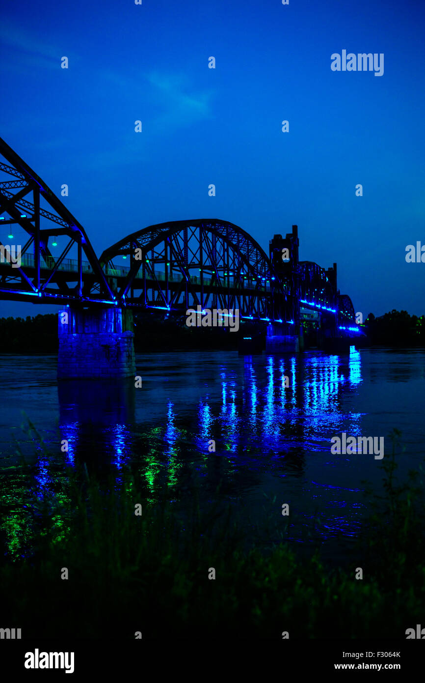 The 1899 Rock Island Railroad Bridge across the Arkansas River at night ...