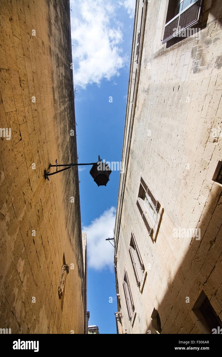 Old buildings and blue sky inside old city walls on a sunny day in ...