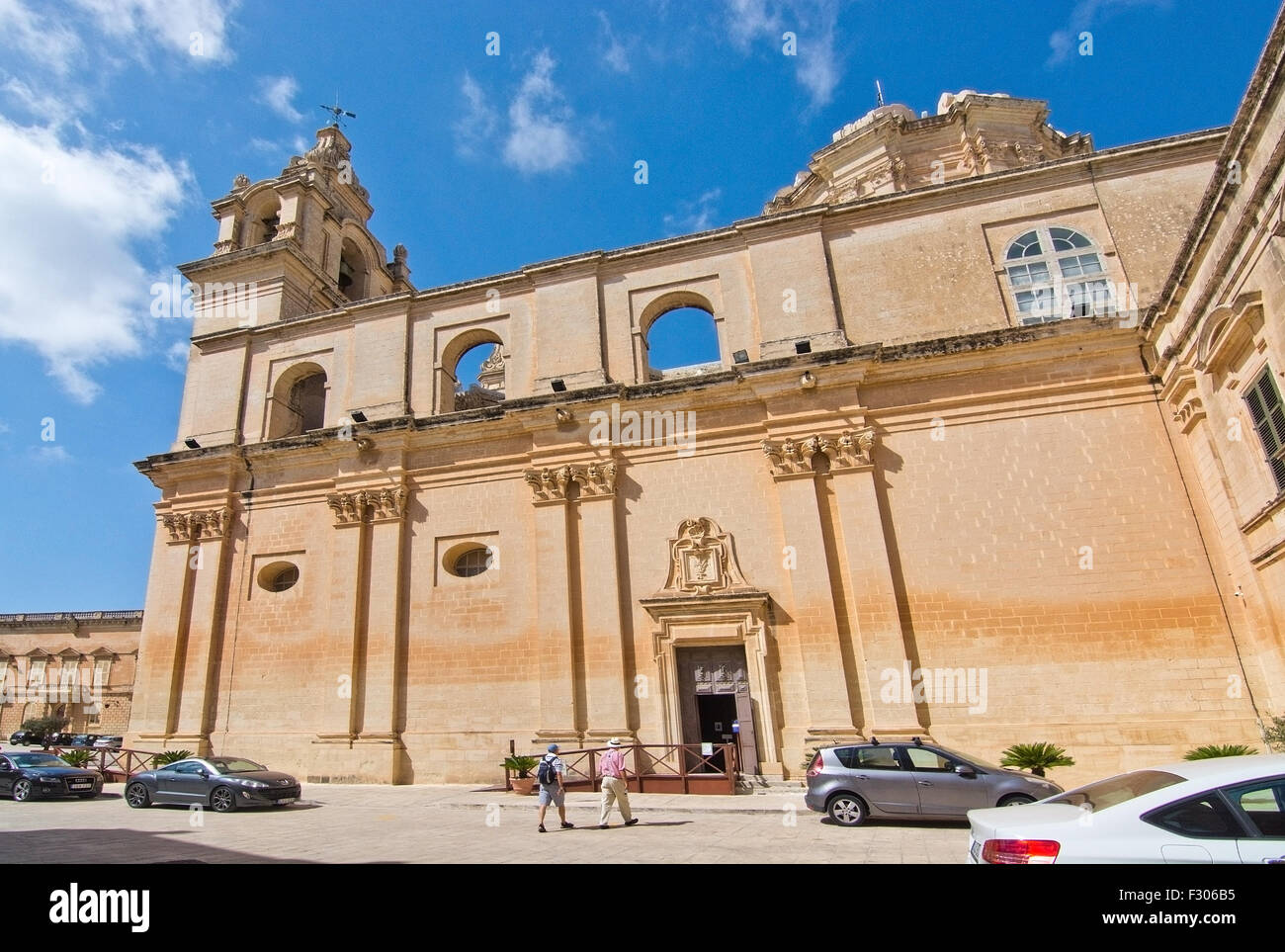 Baroque church building with open portal windows inside old city walls ...