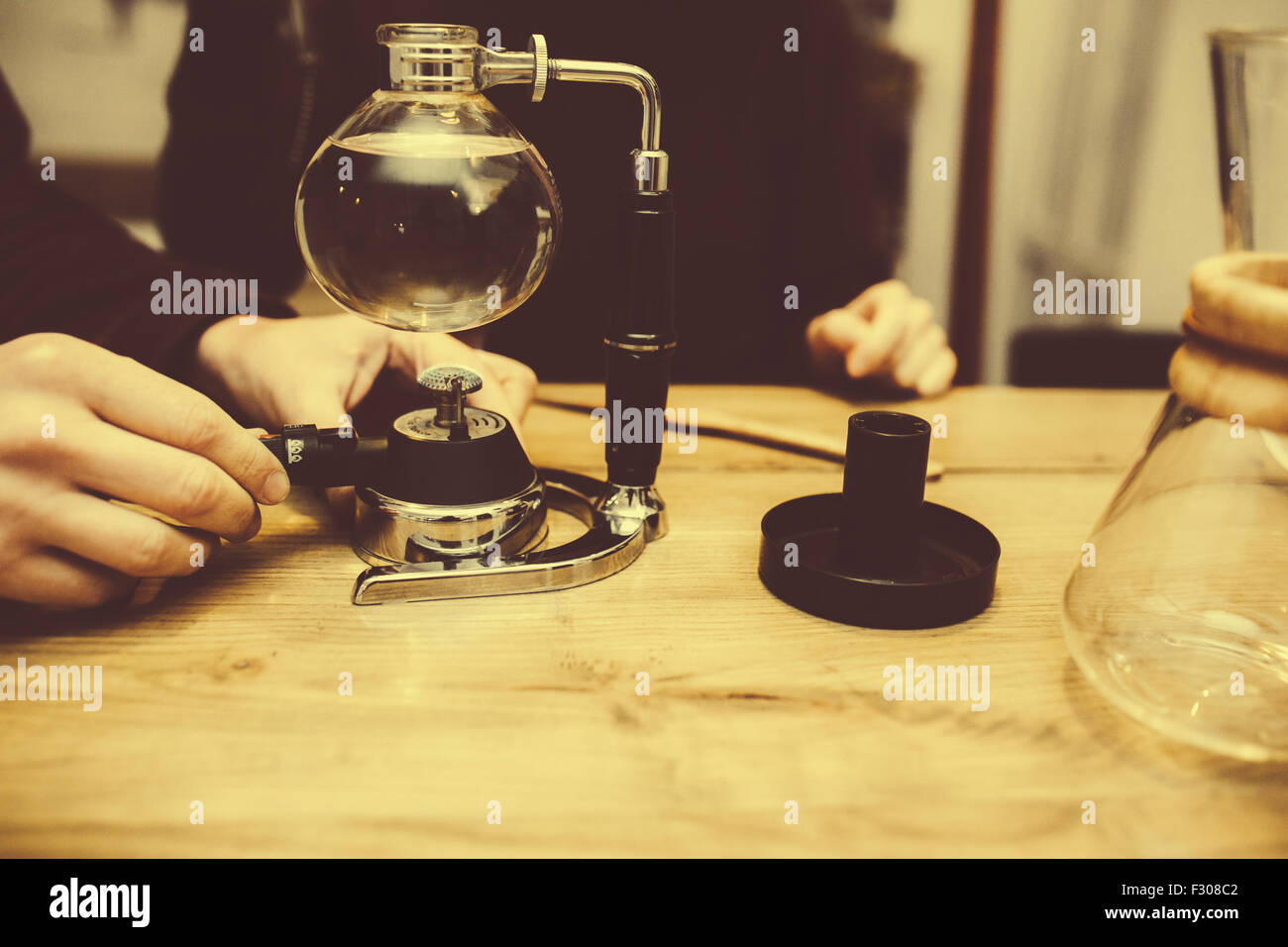 Preparation of vacuum coffee Stock Photo - Alamy