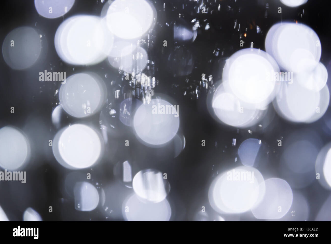 Silver bokeh of christmas lights background Stock Photo - Alamy