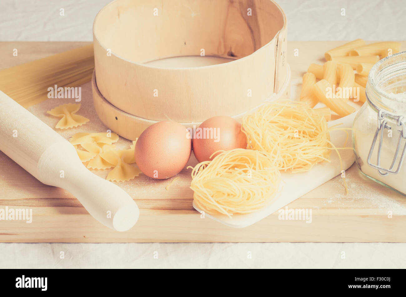 To prepare the paste tools and ingredients on the table Stock Photo - Alamy