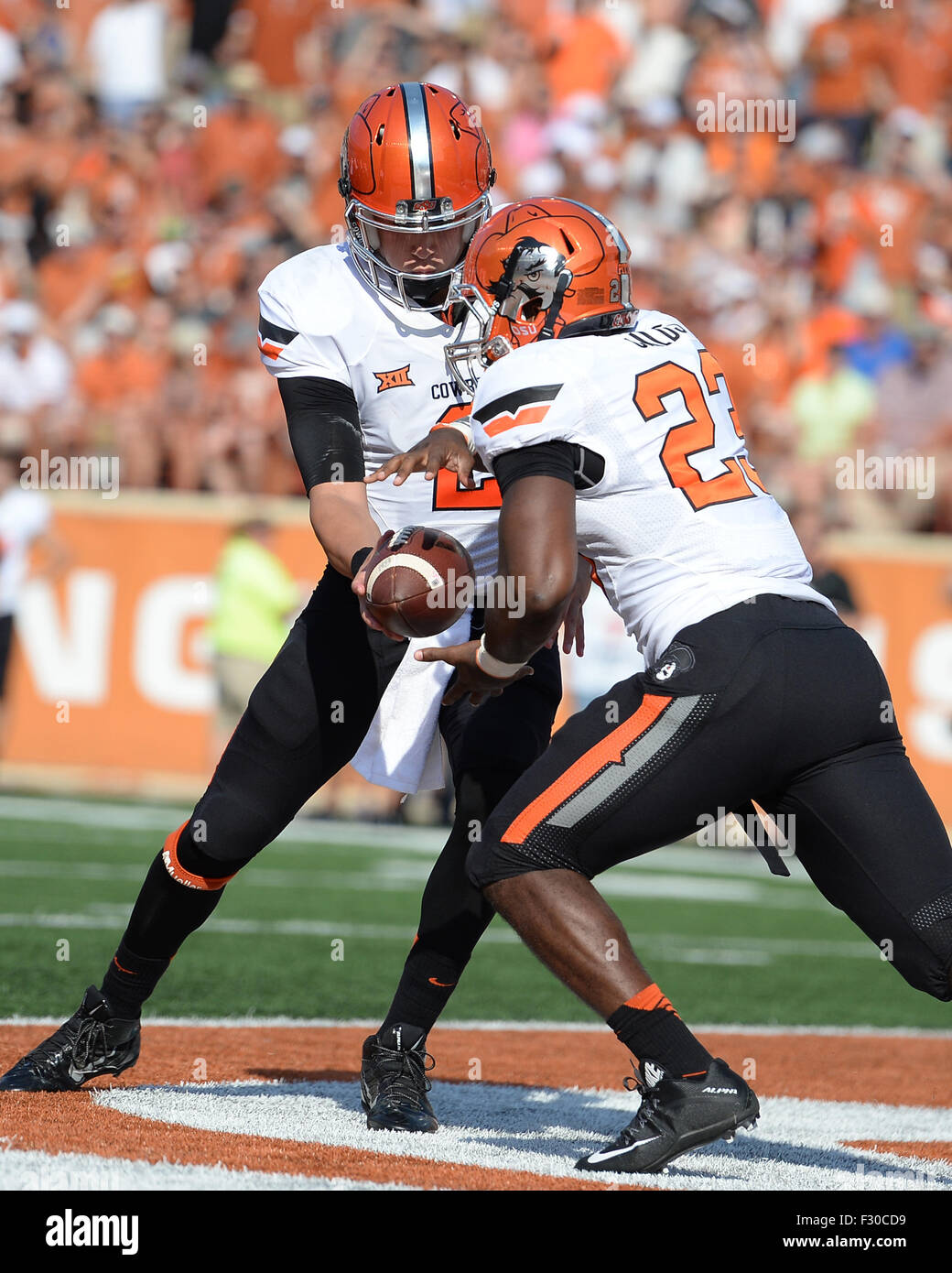 Sept 26, 2015. Rennie Childs #23 gets the hand off from Mason Rudolph ...