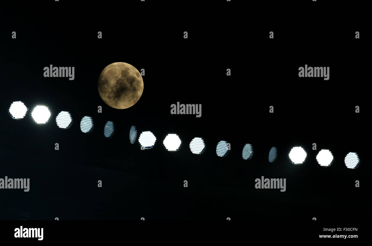 London, UK. 26th Sep, 2015. The moon is seen over the Twickenham ...