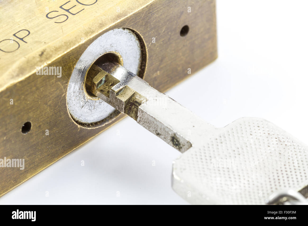 Master key isolated on white background Stock Photo - Alamy