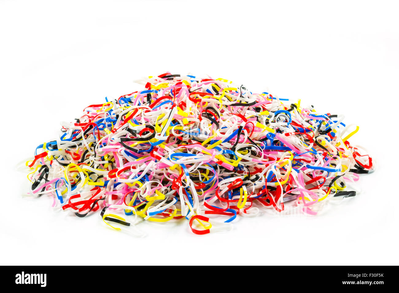 Colorful plastic band on white background Stock Photo - Alamy