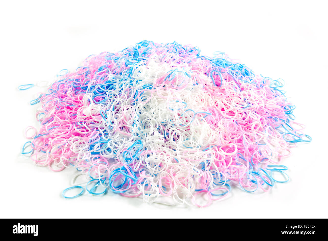 Small white blue and pink plastic band on white background Stock Photo ...