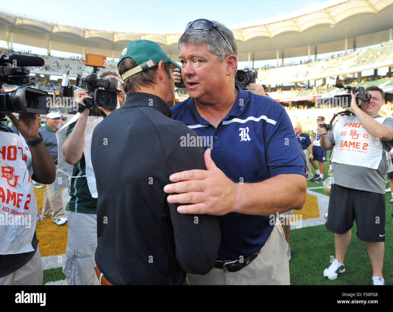 September 26, 2015: Baylor coach Art Briles (left) and Rice coach David ...