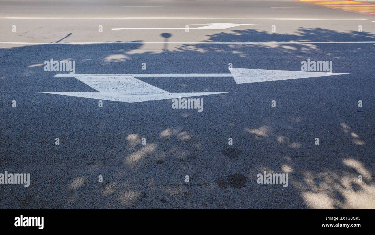 Road sign on asphalt road Stock Photo - Alamy
