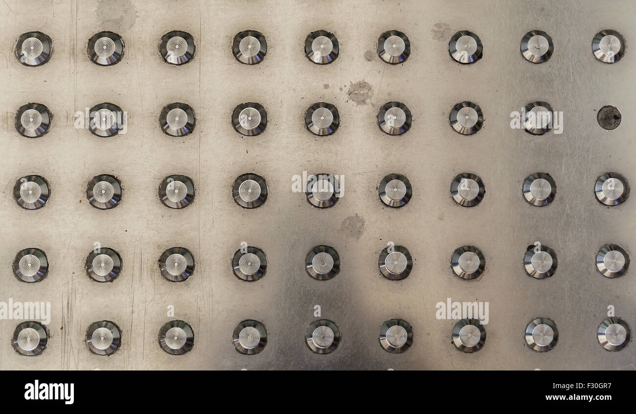 Steel plate with rivets on the floor in front of the escalator Stock ...