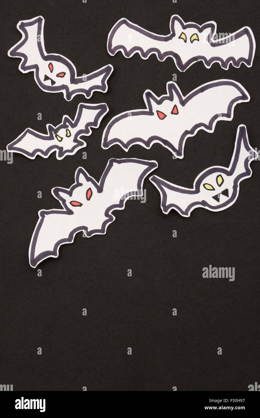 a vertical overhead view of some Halloween decorations: bats Stock ...