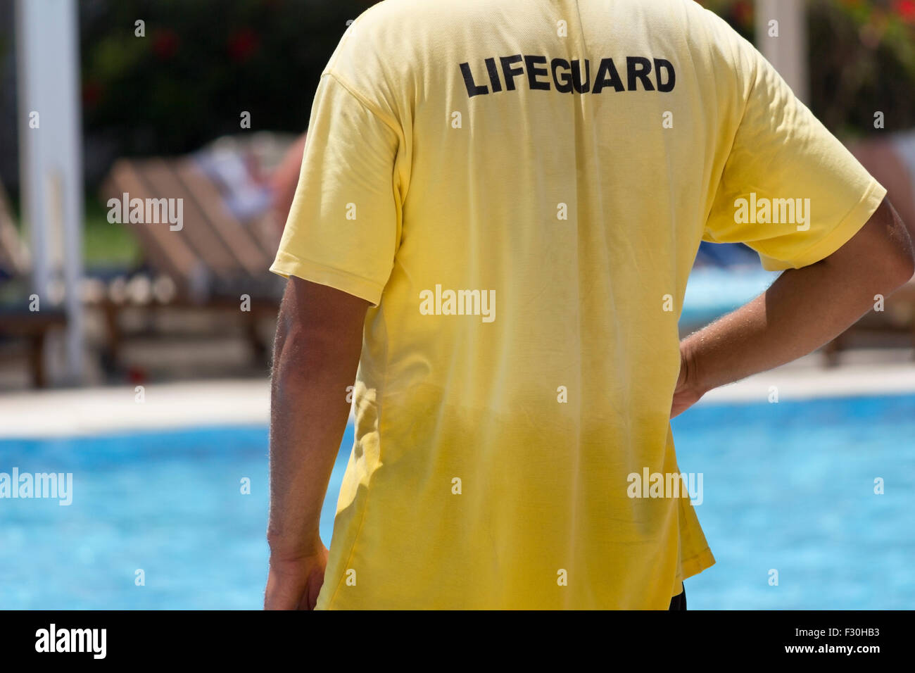 Pool lifeguard hi-res stock photography and images - Alamy