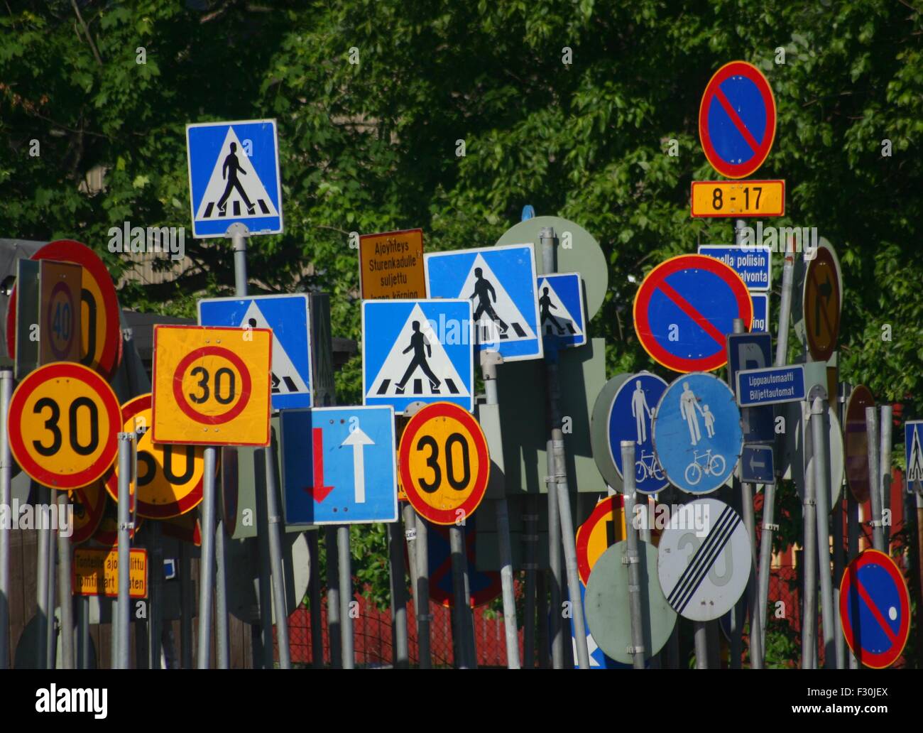 Lots of traffic signs in chaotic order Finland Stock Photo - Alamy
