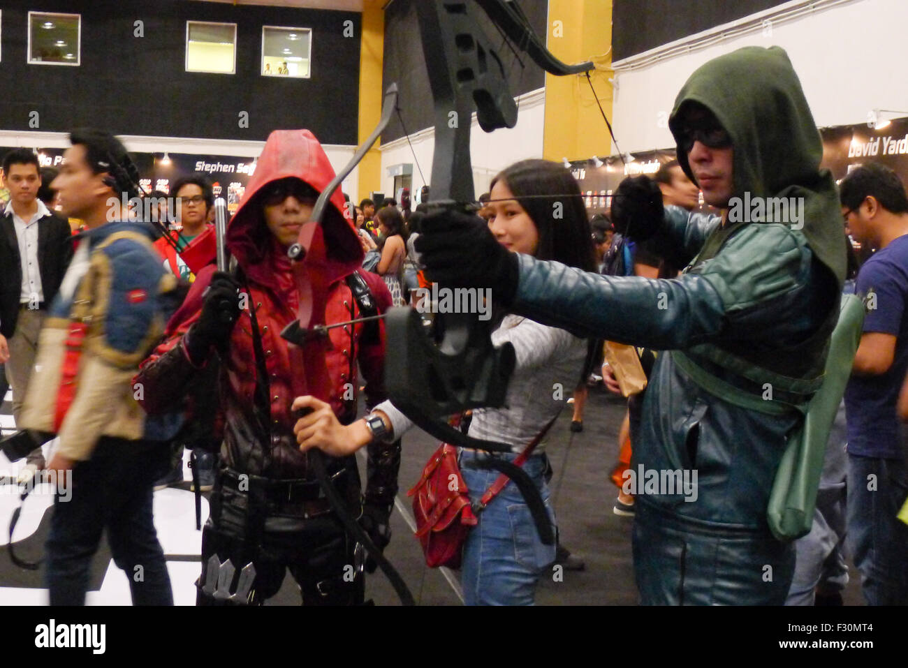 Manila, Philippines. 20th Sep, 2015. Two male cosplayers, suits up with ...