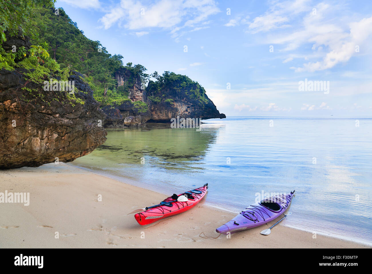 kayaks on a beach Stock Photo - Alamy
