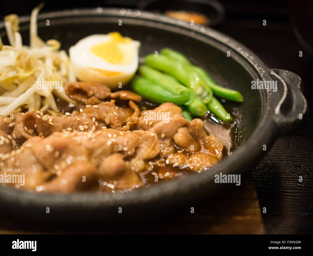 Grill pork on the pan with cowpea, boiled egg, bean sprouts Stock Photo ...