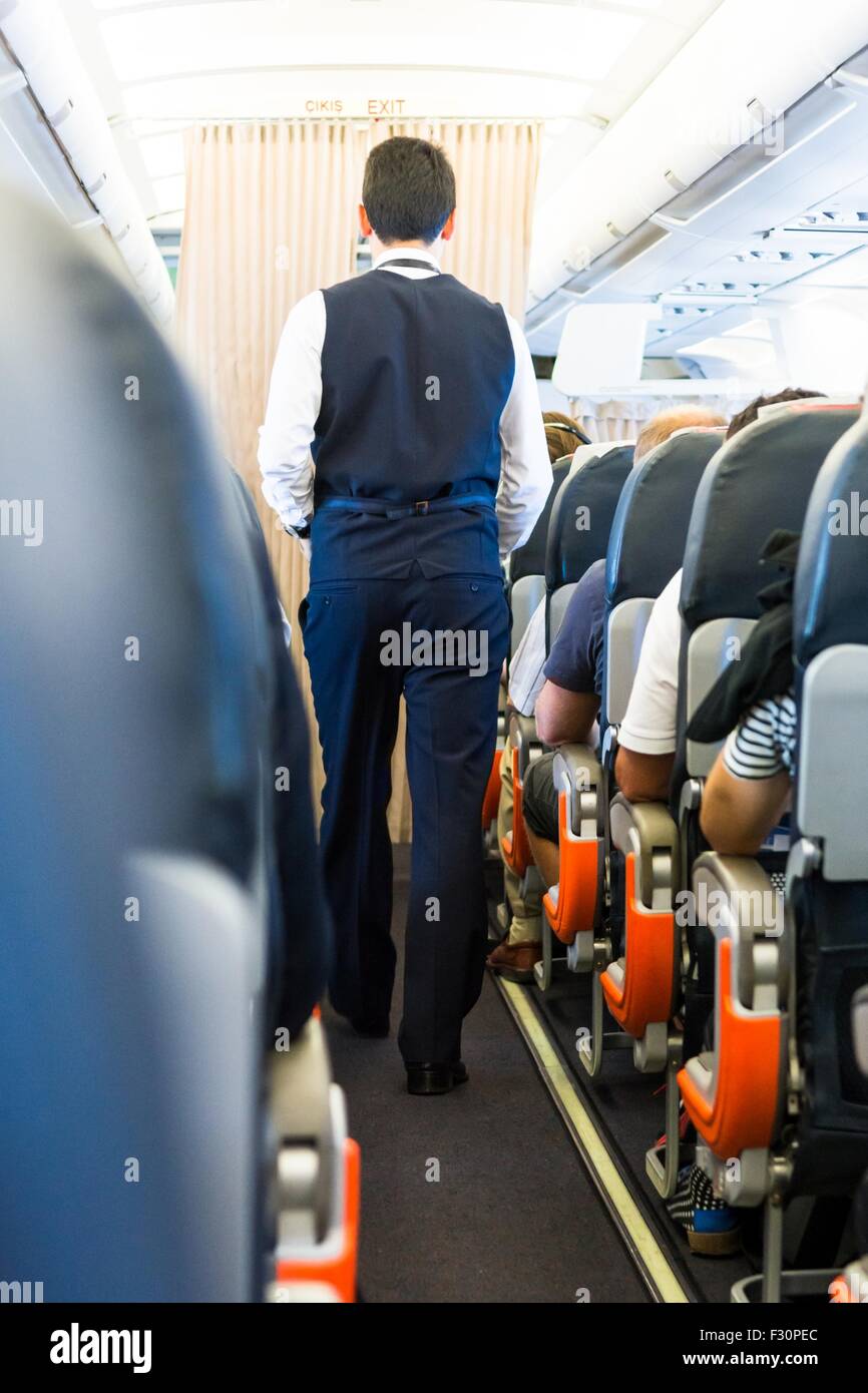 Airplane cabin interior flight attendant hi-res stock photography and ...