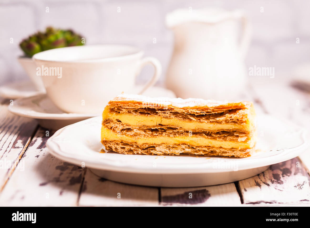 Sweet piece of Napoleon cake Stock Photo - Alamy
