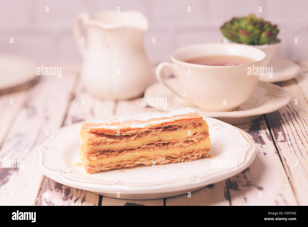 Sweet piece of Napoleon cake Stock Photo - Alamy
