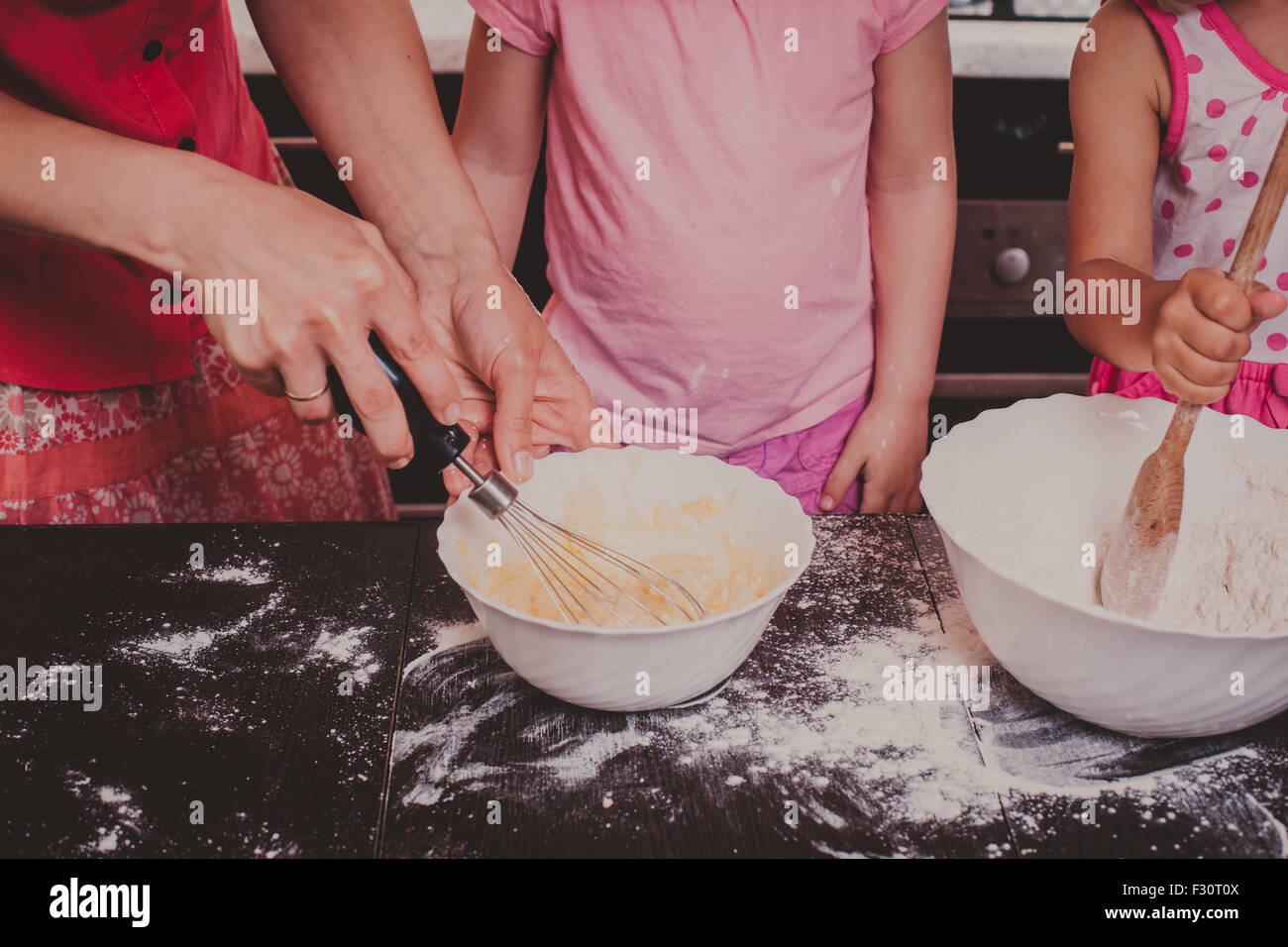 Caucasion family cooking hi-res stock photography and images - Alamy