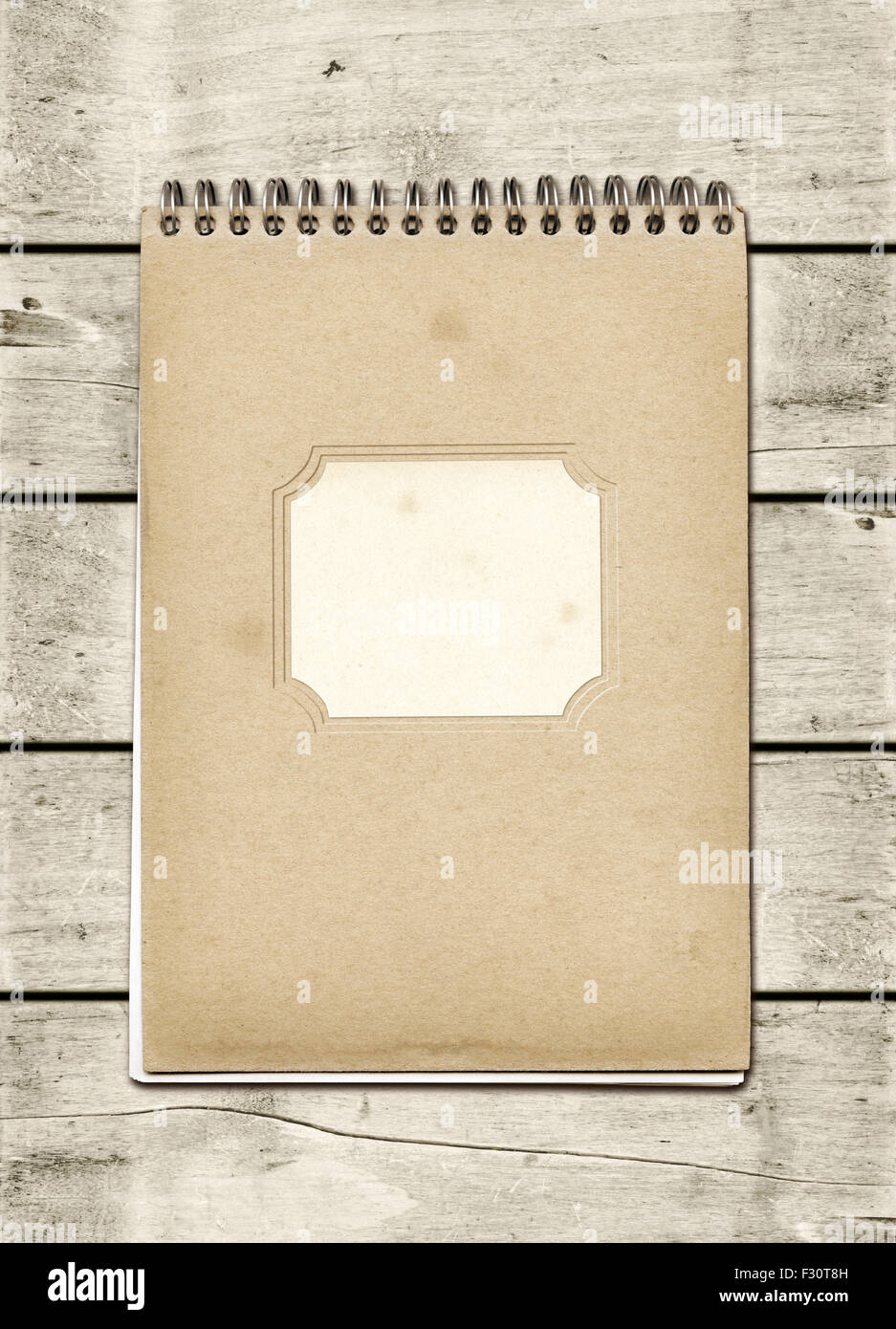 Closed spiral Note book on a white wood table. Mockup Stock Photo - Alamy
