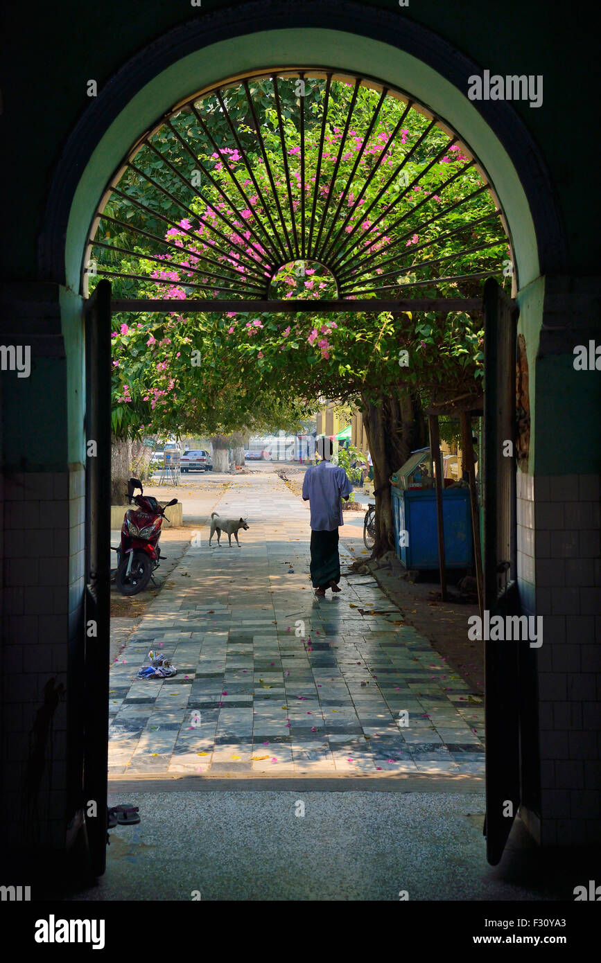 View through attractive entrance to pathway in Mandalay, Myanmar ...