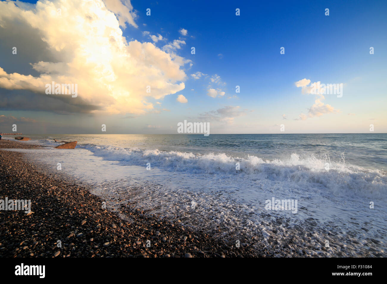 Seashore with breakewater tide water beach landscape Stock Photo - Alamy