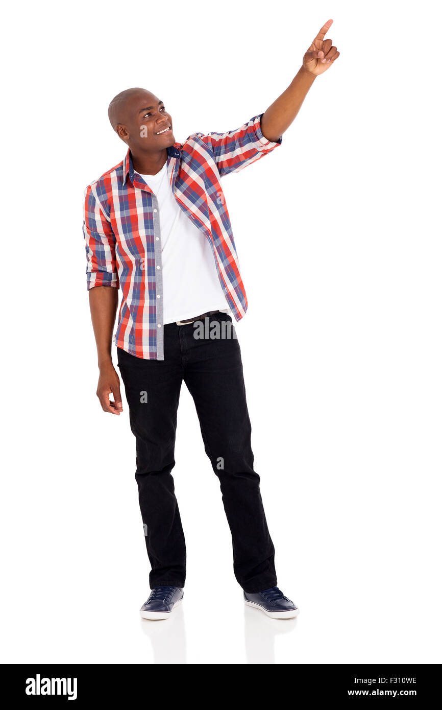 young African man pointing empty space isolated on white background ...